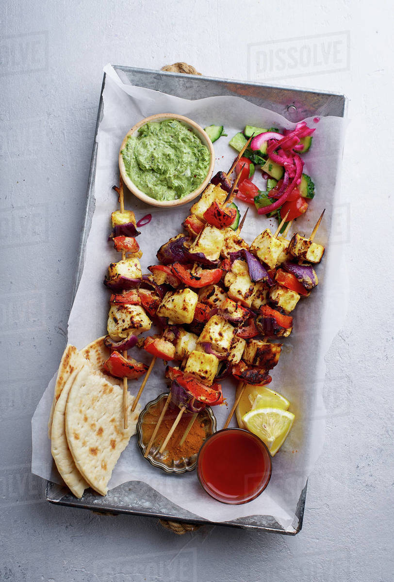 Paneer tikka starter kebabs with mint chutney and chapati. Traditional ...