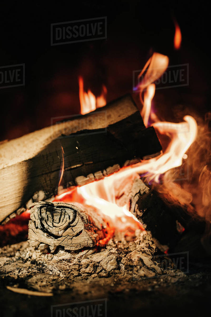 burning smoldering fire in a stone fireplace at home - Royalty-free ...