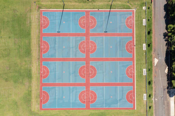 Colorful netball courts and large sports fields in regional New South ...