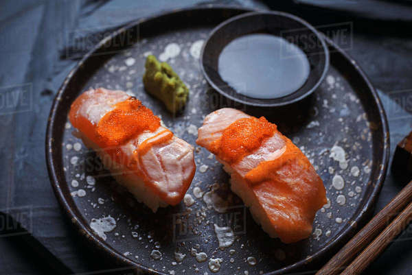 Burned salmon sushi with soy sauce and wasabi - Royalty-free Stock ...