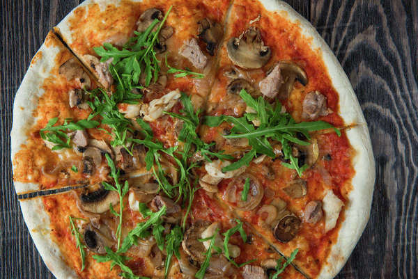 Pizza with chicken mushrooms and rukkola - Royalty-free Stock Photo ...