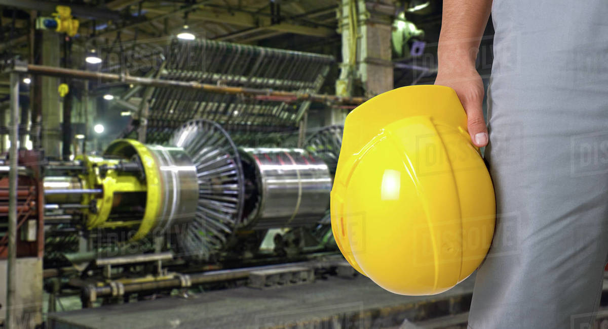 Worker with safety helmet at industrial factory - Royalty-free Stock ...