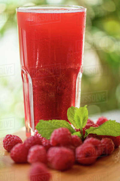 Fruit non-alcoholic drink with raspberries - Stock Photo - Dissolve