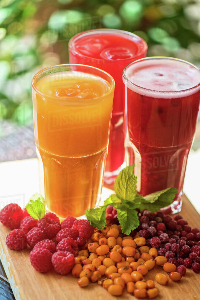 Set of fruit non-alcoholic drink with cranberries raspberries and sea ...