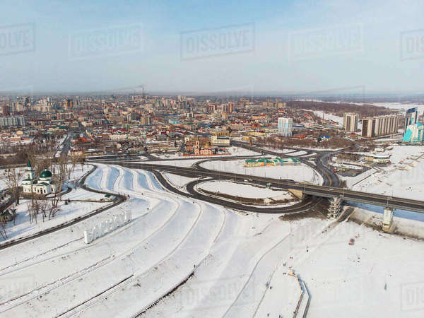 Aerial shot of bridge and car driving on the bridge, winter sunny day ...