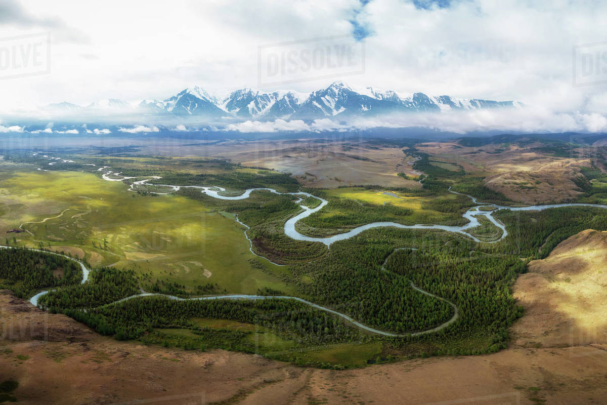 Kurai steppe and Chuya river on North-Chui ridge background. Altai ...