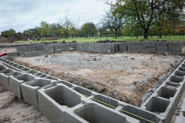 Foundations of the house, unfinished bungalow, rough construction ...