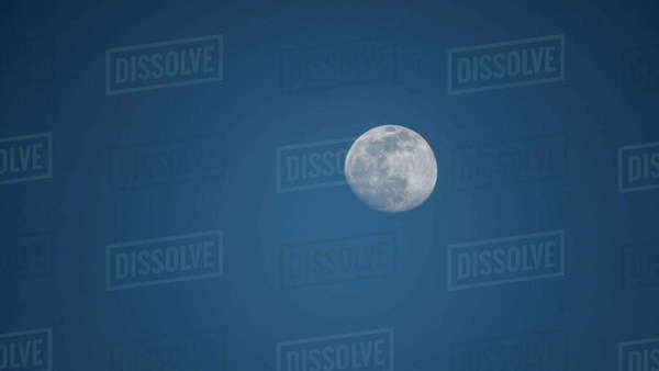 full moon by day - Royalty-free Stock Photo | Dissolve
