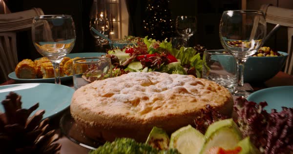 Family holiday dinner table set with healthy organic nutritious meals ...