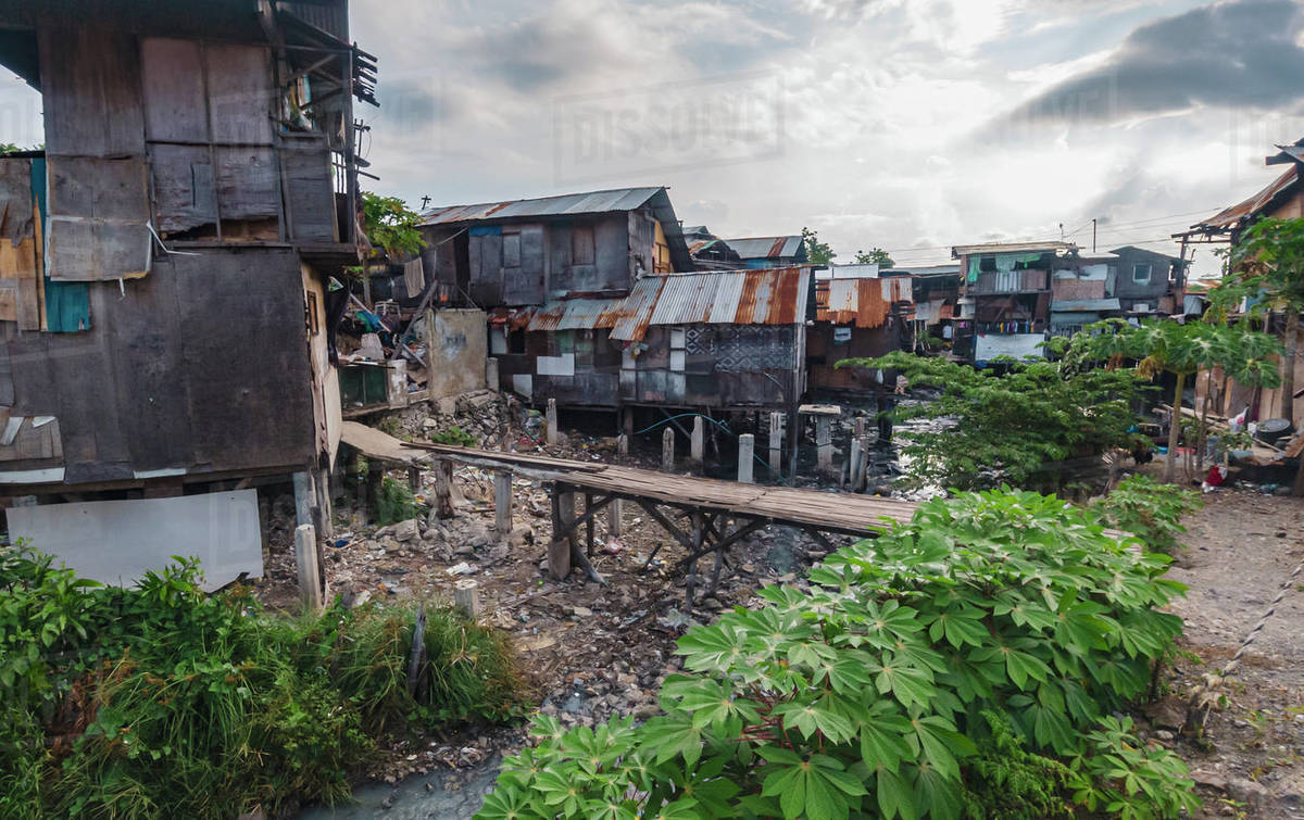 Life amidst challenges in a philippine slum community surrounded by ...