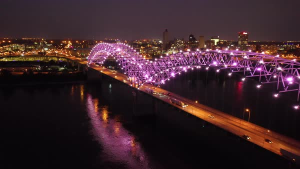 Good rising evening night aerial of Memphis Hernando De Soto Bridge ...