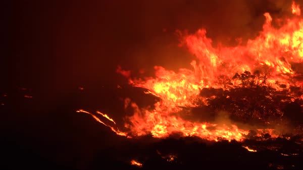 2019 - huge flames rise at night as the Cave Fire near Santa Barbara ...