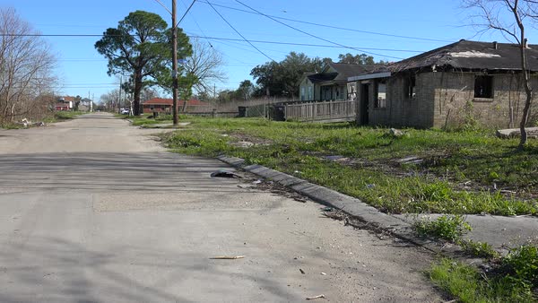 Houses stand amidst empty and undeveloped lots in the Lower 9th Ward of ...