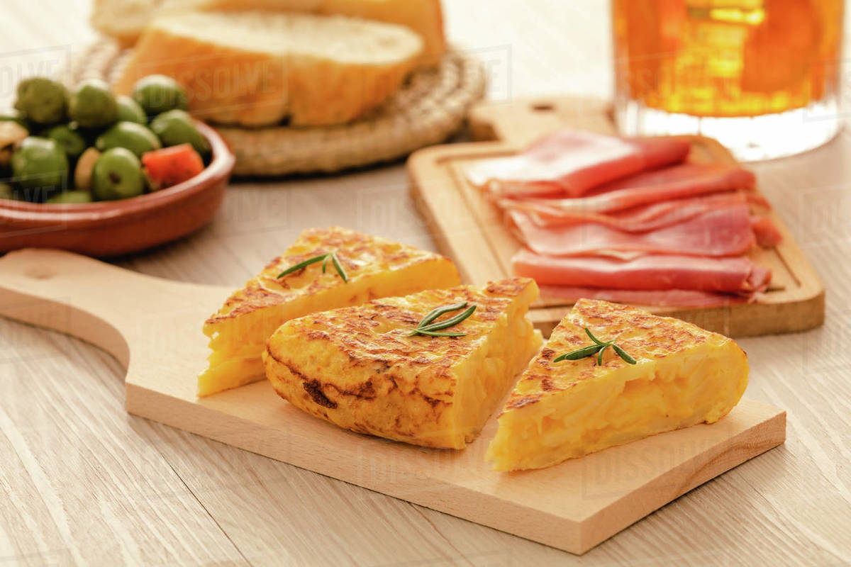 Still life with spike typical Spanish potato omelette tapas - Royalty ...