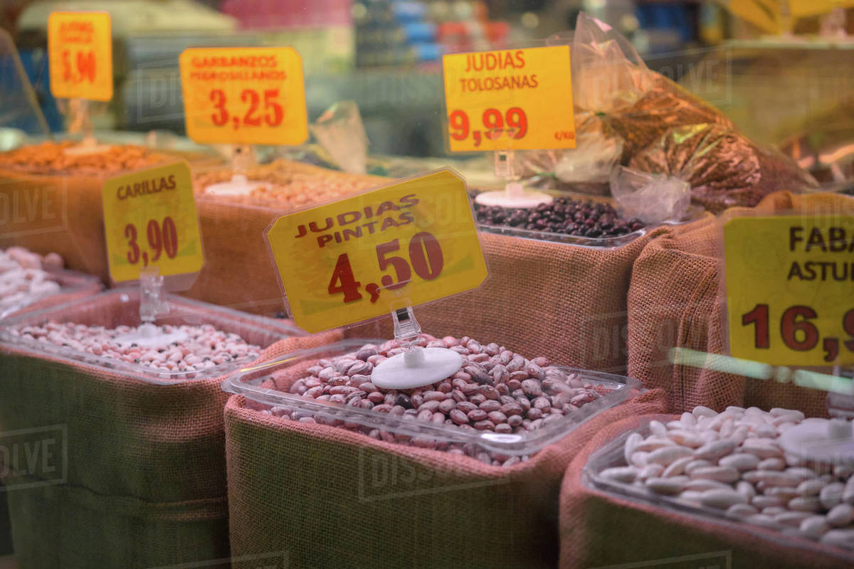 A variety of grains like beans on a store counter with prices - Royalty ...
