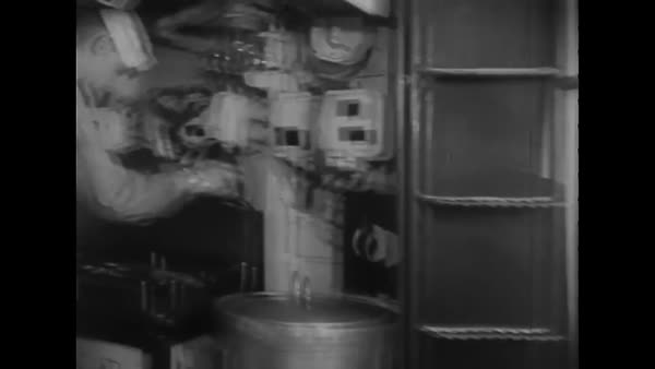 A cook is shown with an oven and stove as well as a navigator and ...