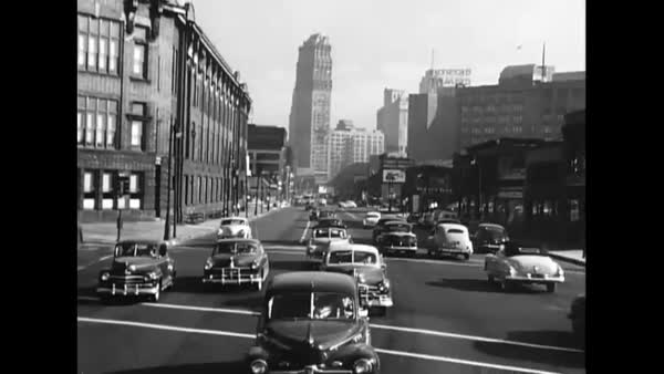 1940s - Automobile workers arrive at work in the morning at a factory ...
