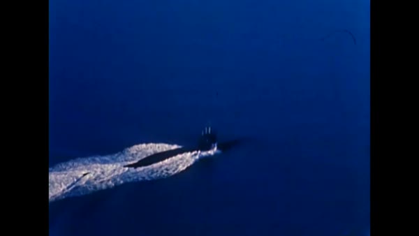 1964 - An aerial view shows a US Navy nuclear submarine breaching. - HD ...