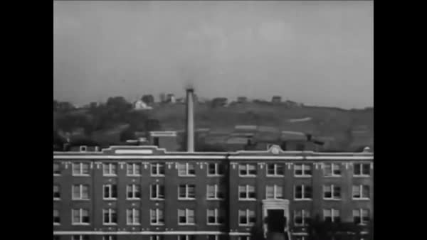 Westinghouse Electric factories' exteriors are shown as a brief ...