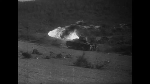 1944 - Russian flame throwing tanks and machine gunners clear a path ...