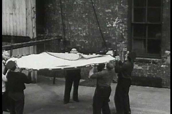 Firefighters in training use a trampoline net in the 1940s. - SD ...