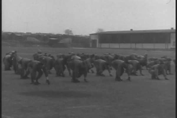 Soldiers do their daily physical exercises at camp, then proceed to do ...