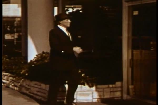 A mortgage banker in the 1950s is visited by broker from an insurance ...