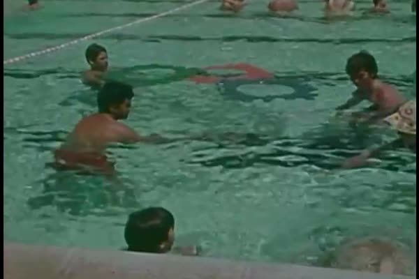 Mentally challenged children swim through obstacle courses in a ...