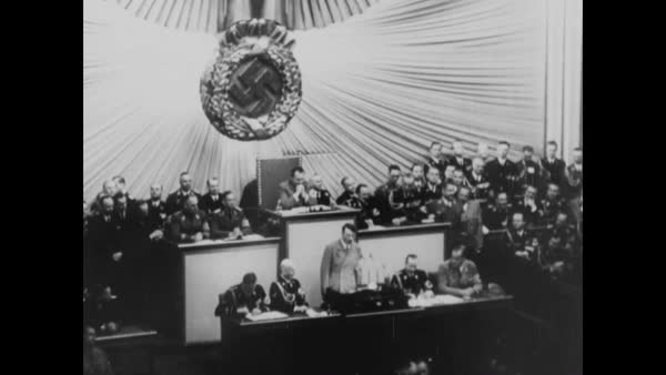 1938 - Adolf Hitler gives a speech to the Nazi Party and Maxim Litvinov ...