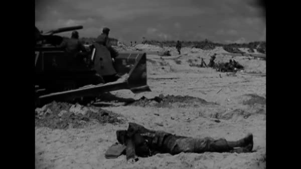 Dead and wounded American soldiers are loaded onto ships after the ...