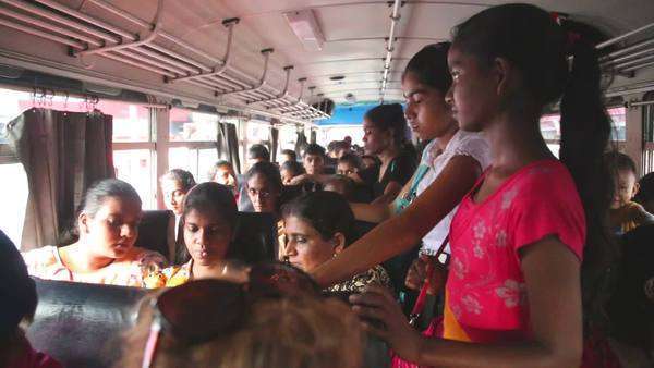 GALLE, SRI LANKA - MARCH 2014: Interior view of a crowded in a bus from ...