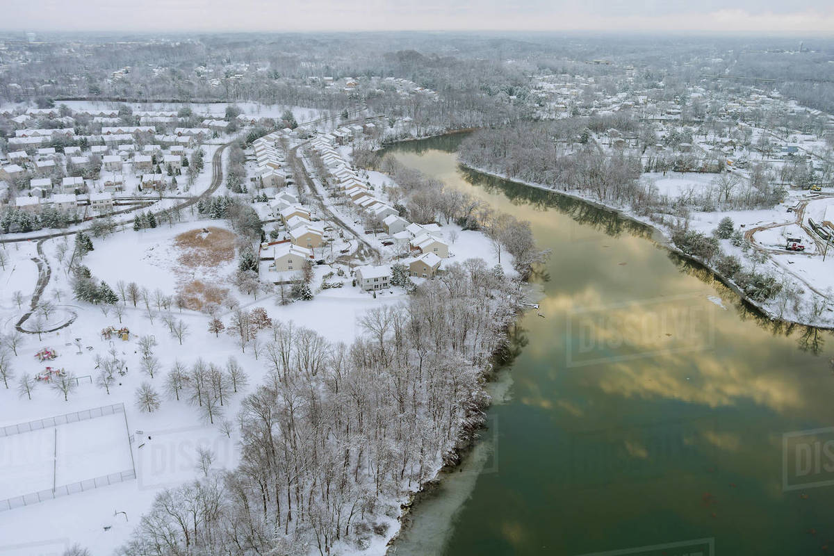 Panoramic top view on snow covered residential district apartment ...
