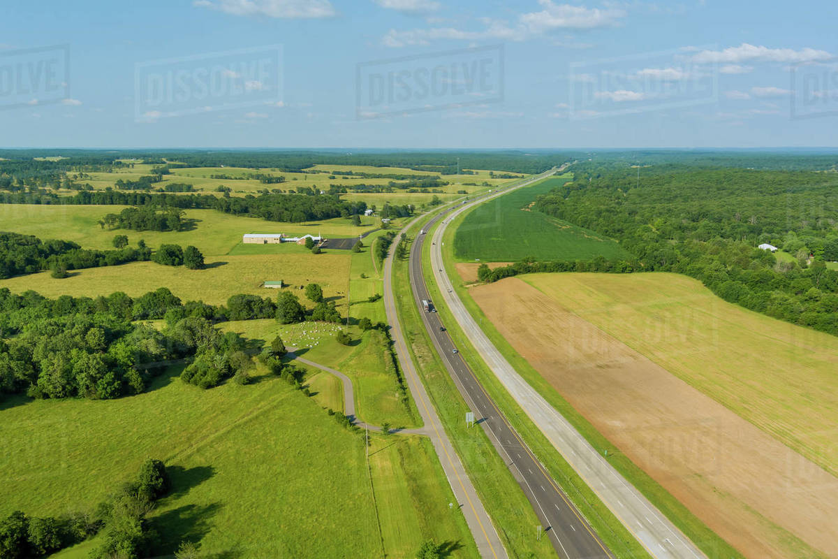 Panorama aerial view of small town near road highway villages located ...