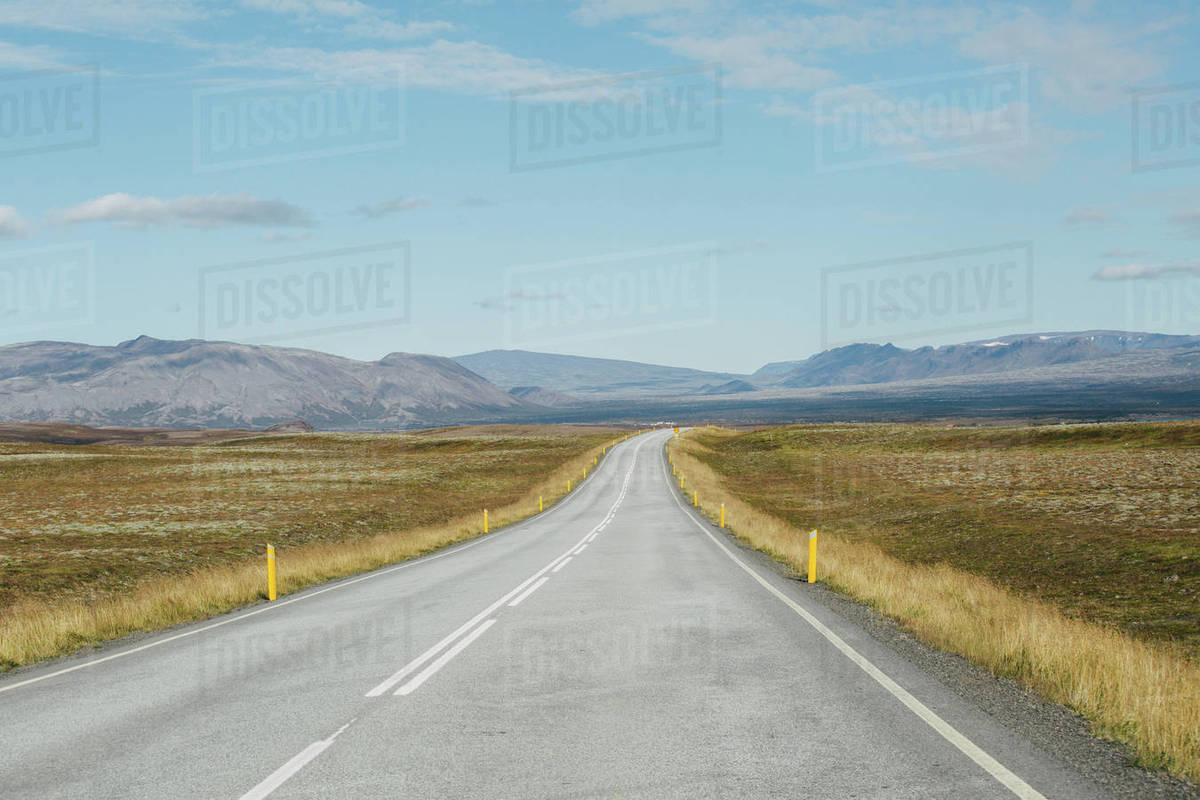 Roadway through beautiful landscape - Stock Photo - Dissolve