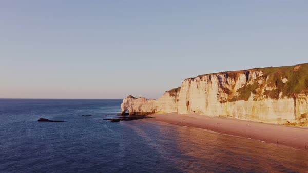 Beautiful coastal cliffs of bizarre shapes with natural arches and wild ...
