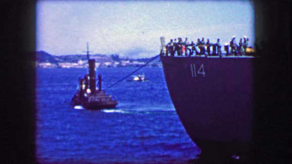 1944: Tugboat pulling USS General William Mitchell (AP-114) troopship ...