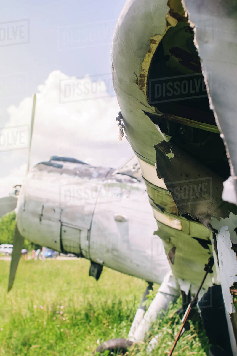 A close-up of an old wrecked passenger plane that has been ...