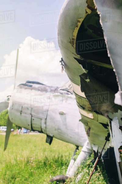 A close-up of an old wrecked passenger plane that has been ...