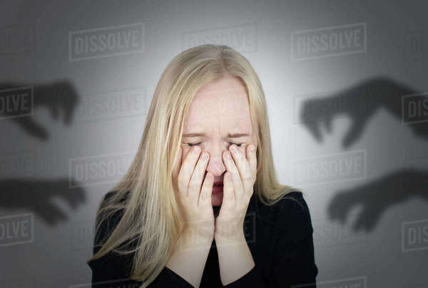 The woman is experiencing a panic attack. The concept of phobia, fears ...