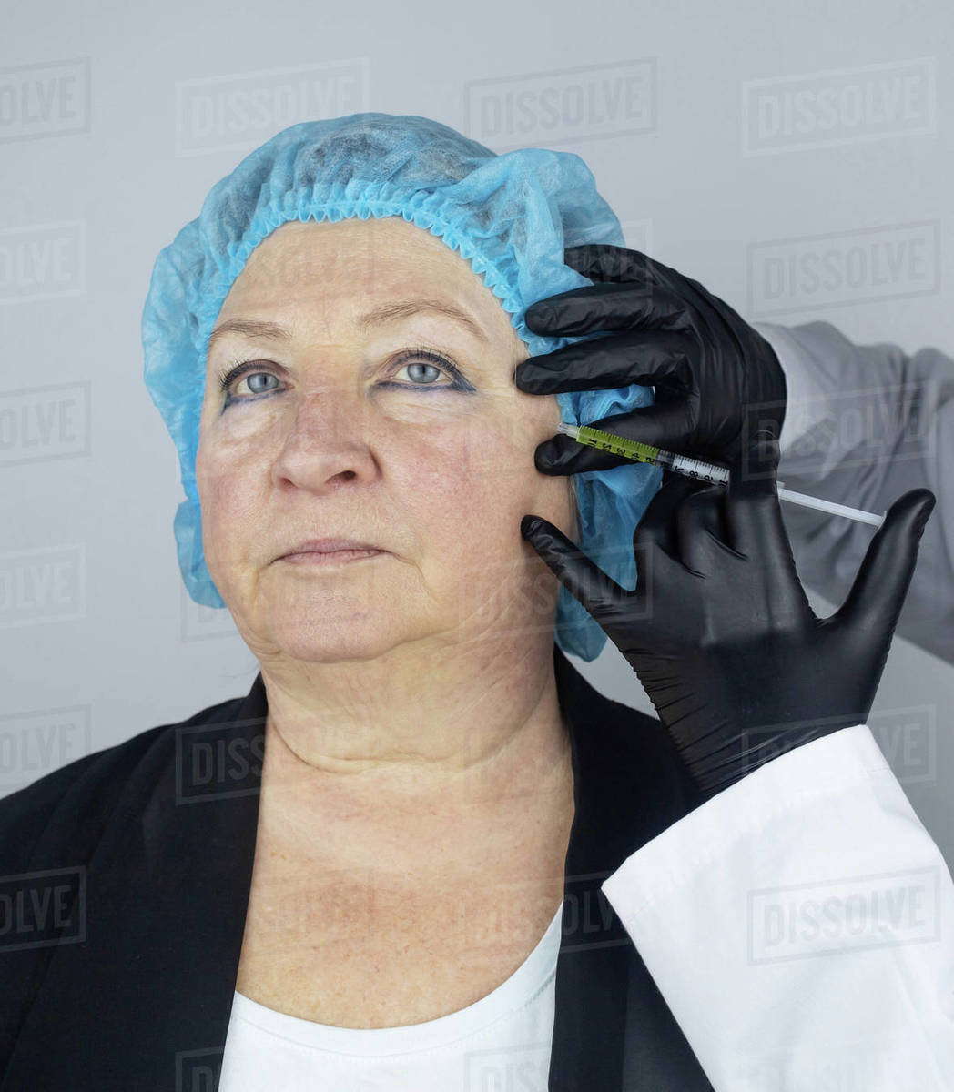 Botulinum toxin injection. Senior woman at the appointment with a ...