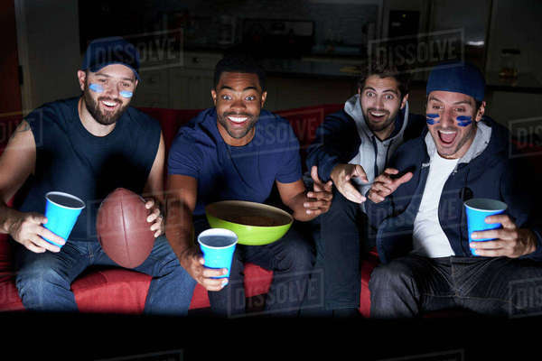 Group Of Male Sports Fans Watching Game On Television - Royalty-free ...
