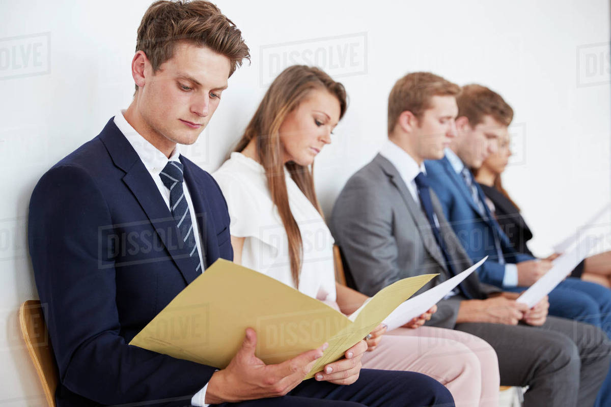 Five candidates waiting for job interviews, close up - Stock Photo ...