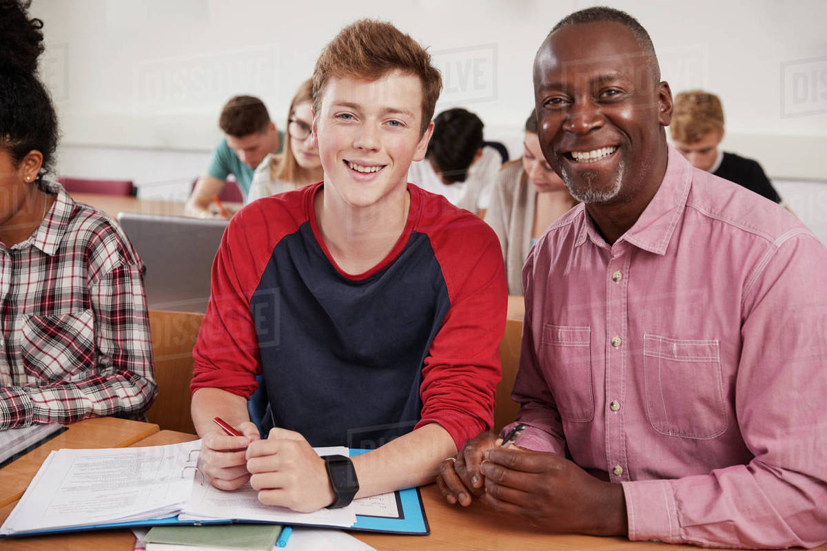 College Student Has Individual Tuition From Teacher In Classroom ...