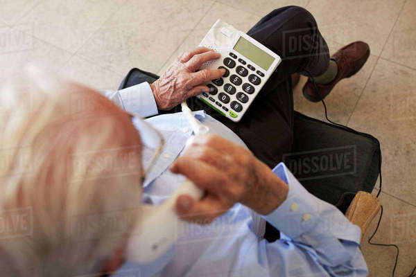 Senior Man At Home Using Distress Alarm Call Button - Royalty-free ...