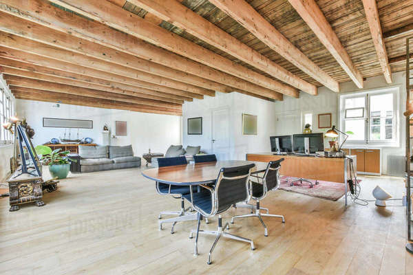 Interior of contemporary big house room with office workspace and gray ...