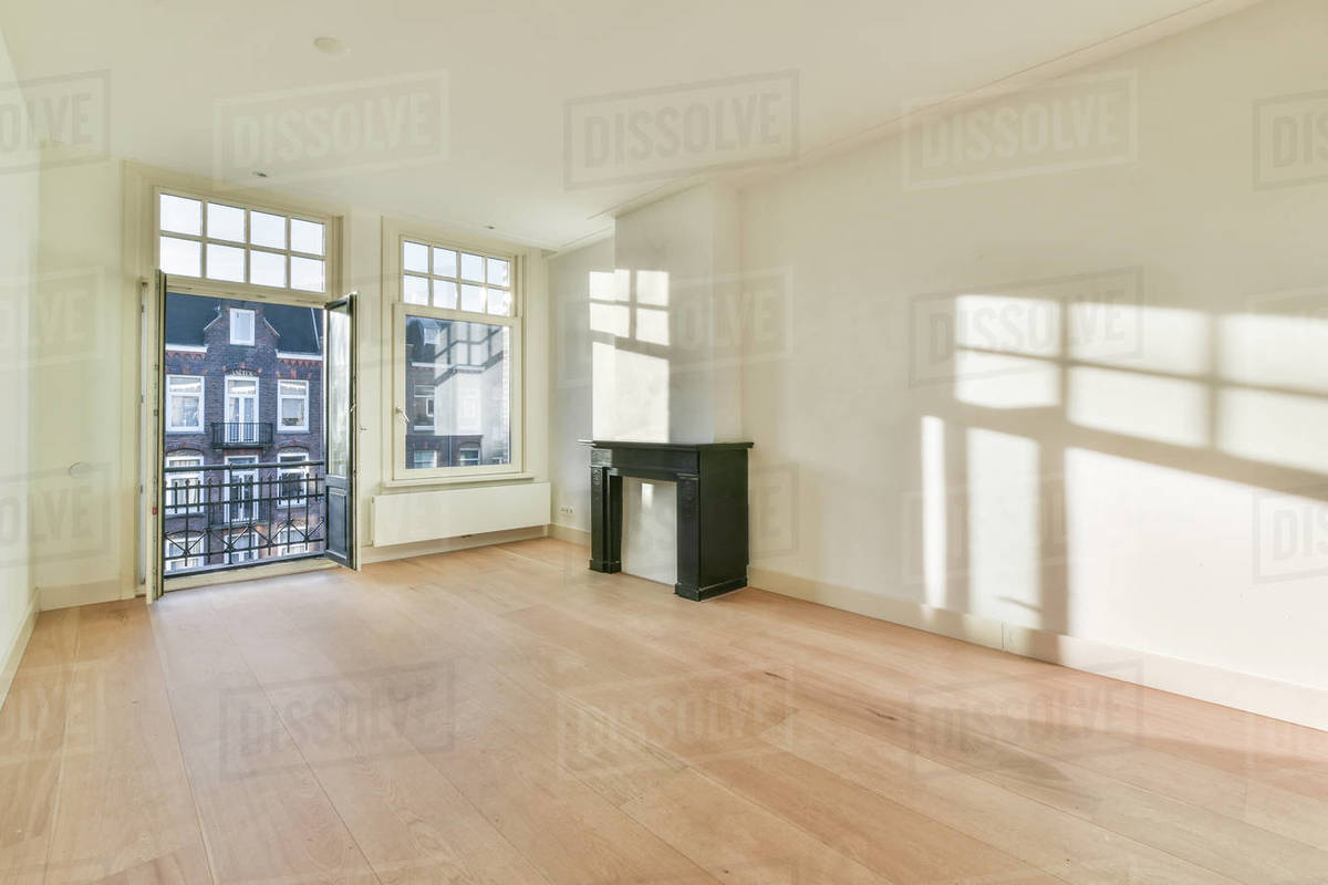 Interior of new apartment, empty living room, wooden floor - Royalty ...