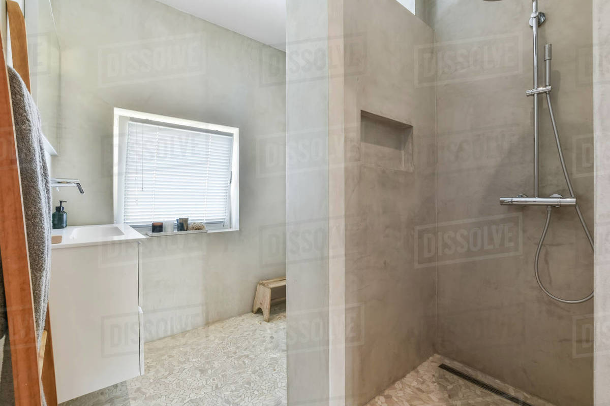 Modern shower stall in a bright bathroom - Stock Photo - Dissolve