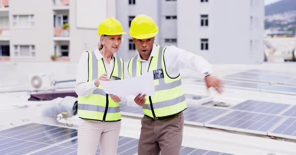 Planning, solar energy or engineering people with blueprint of ...