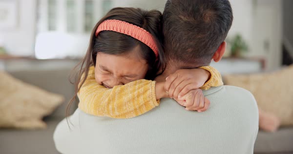 Love, support or dad hugging a girl to relax as a family in living room ...