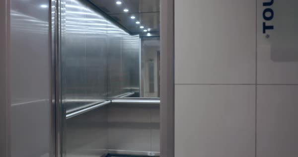 Elevator exit, floor and business people busy in an office for ...